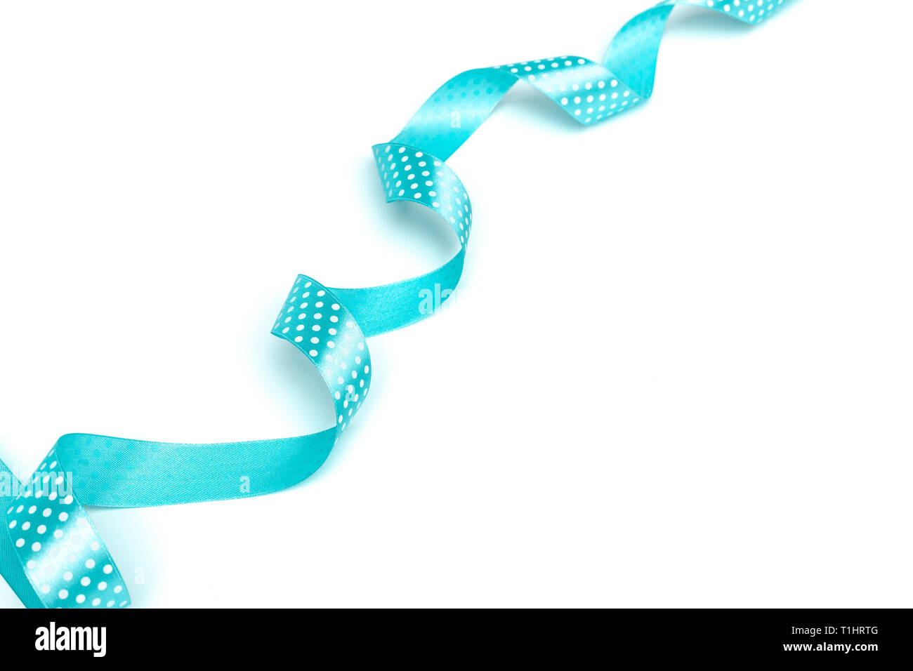 Shiny blue ribbon isolated on white Stock Photo - Alamy