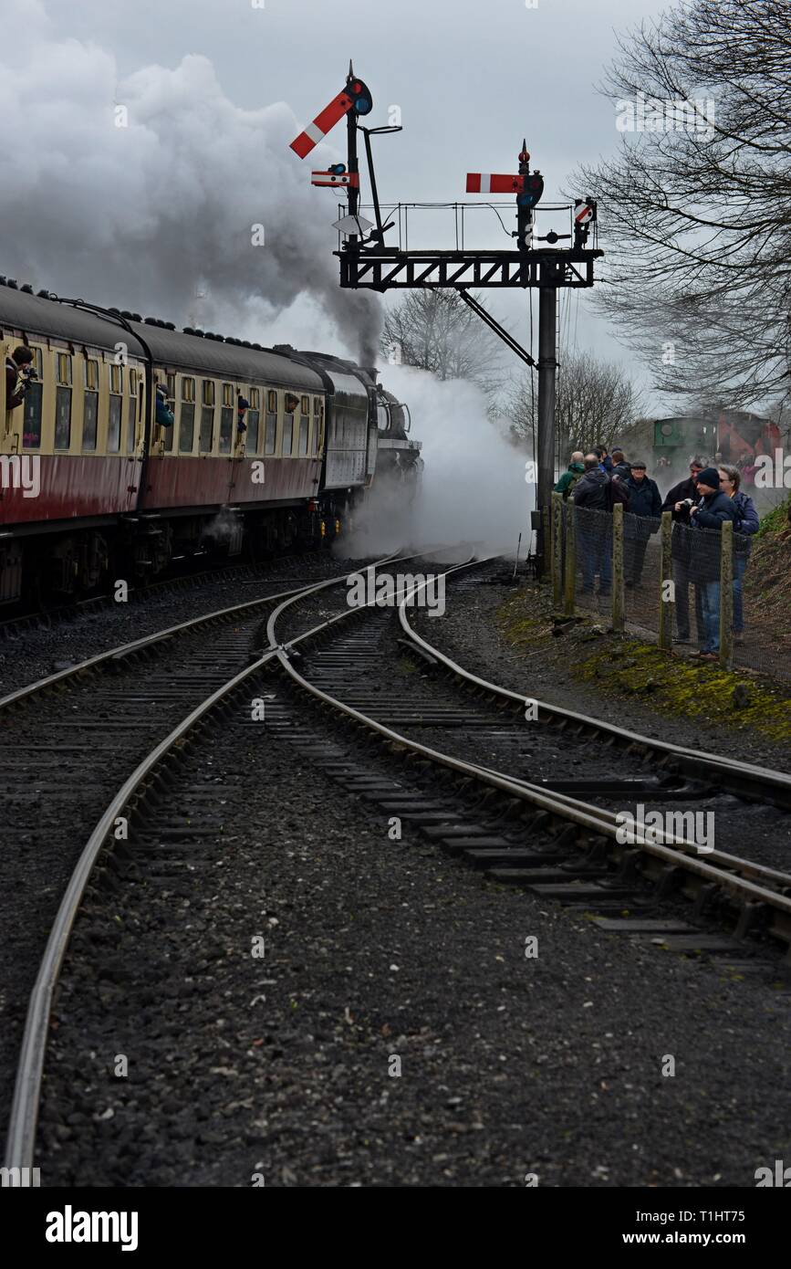Rail enthusiasts watch as steam locomotive 75069 leaves Bridgnorth ...