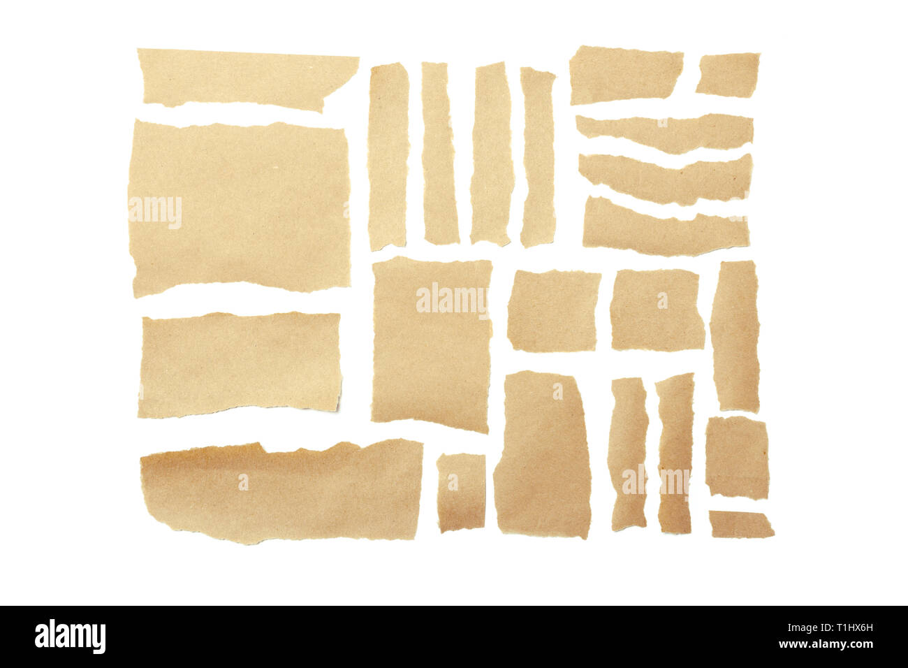 brown ripped pieces of paper on white background Stock Photo - Alamy