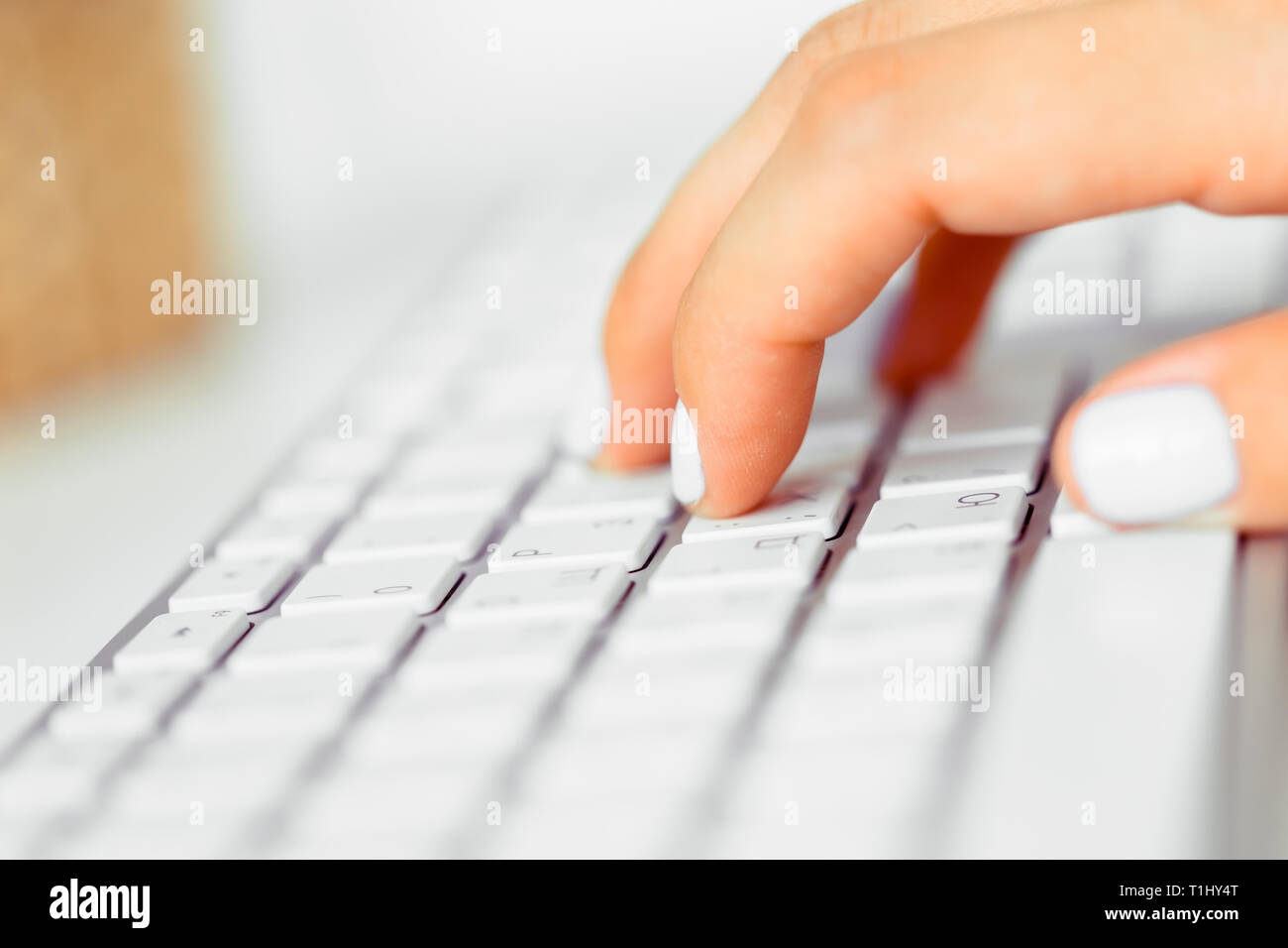 Hands of an office woman typing Stock Photo - Alamy