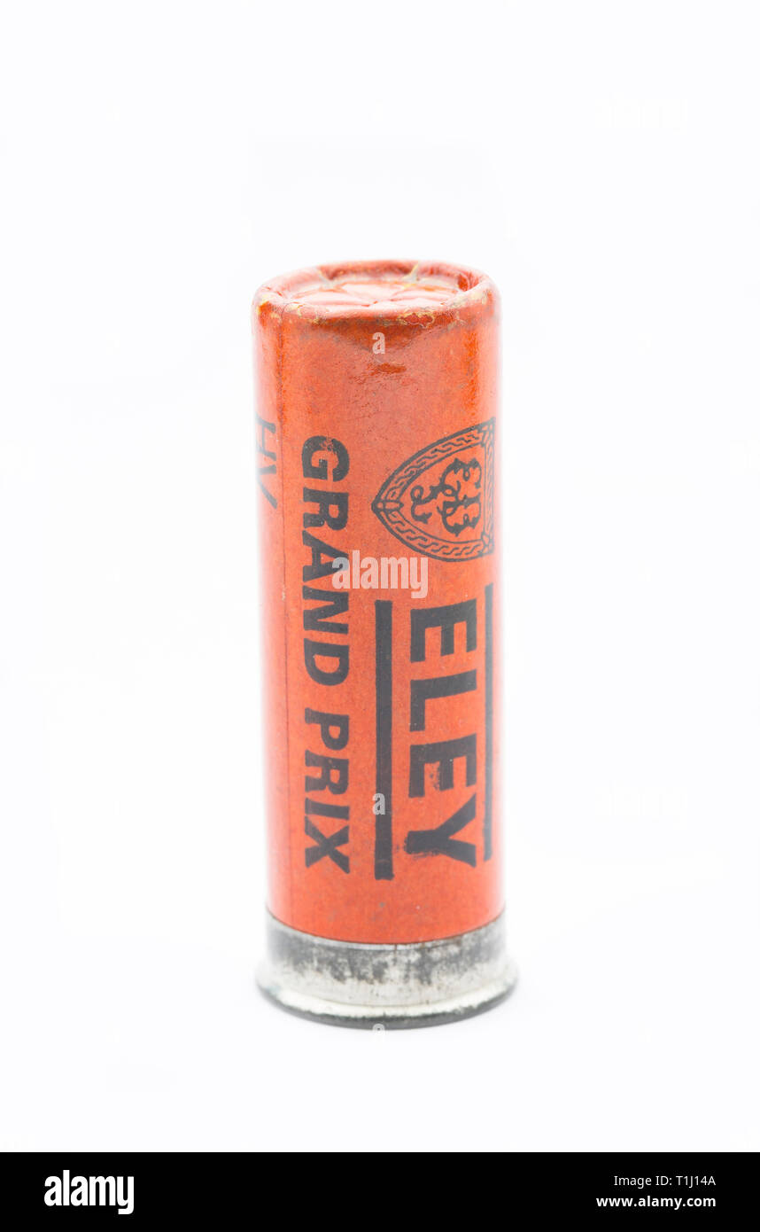 A paper case Eley Grand Prix 12 gauge, or bore, shotgun cartridge with ...