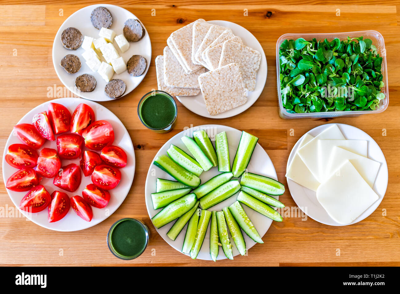 Wooden table with food flat top view setting of healthy vegan ...