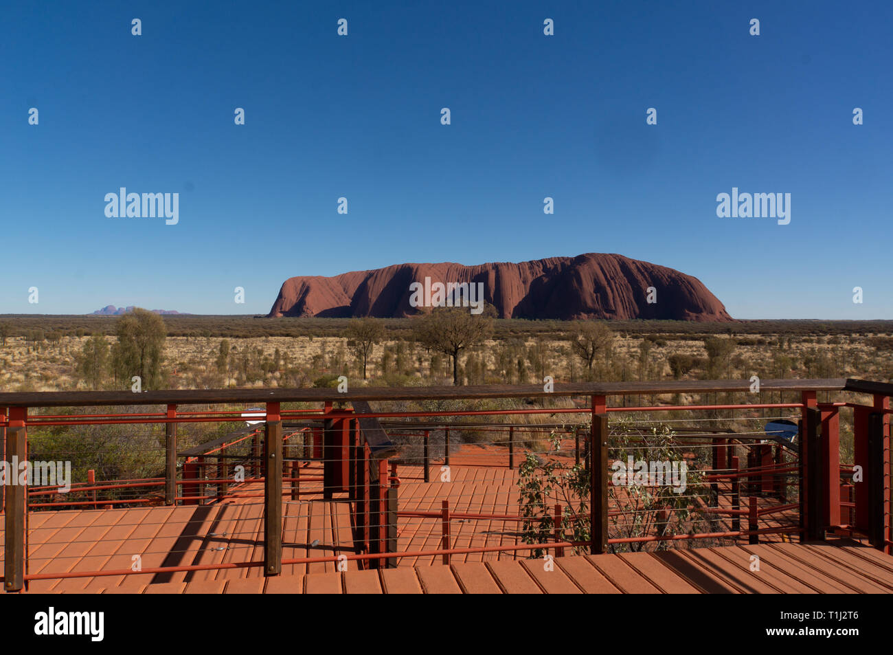 Uluru at sunrise under beautiful blue sky, Uluru-Kata Tjuta National ...
