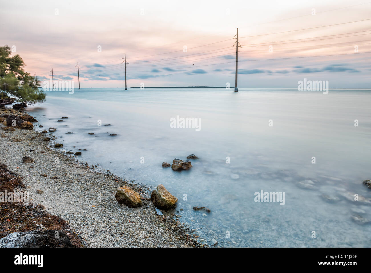 Sunset in Islamorada, Florida Keys with sky rocks power lines on rocky ...