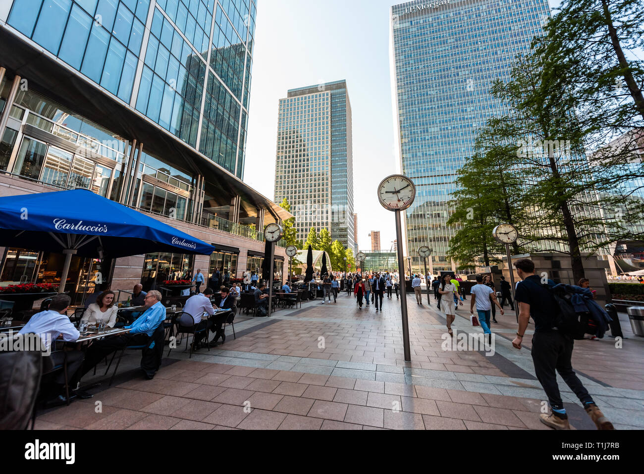 London, UK - June 26, 2018: People commuters outside metro entrance ...