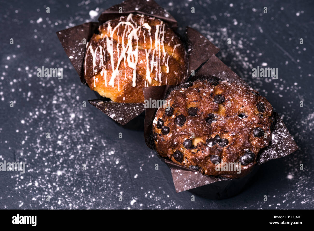 Dark key. Chocolate cake with filling on dark background Stock Photo ...