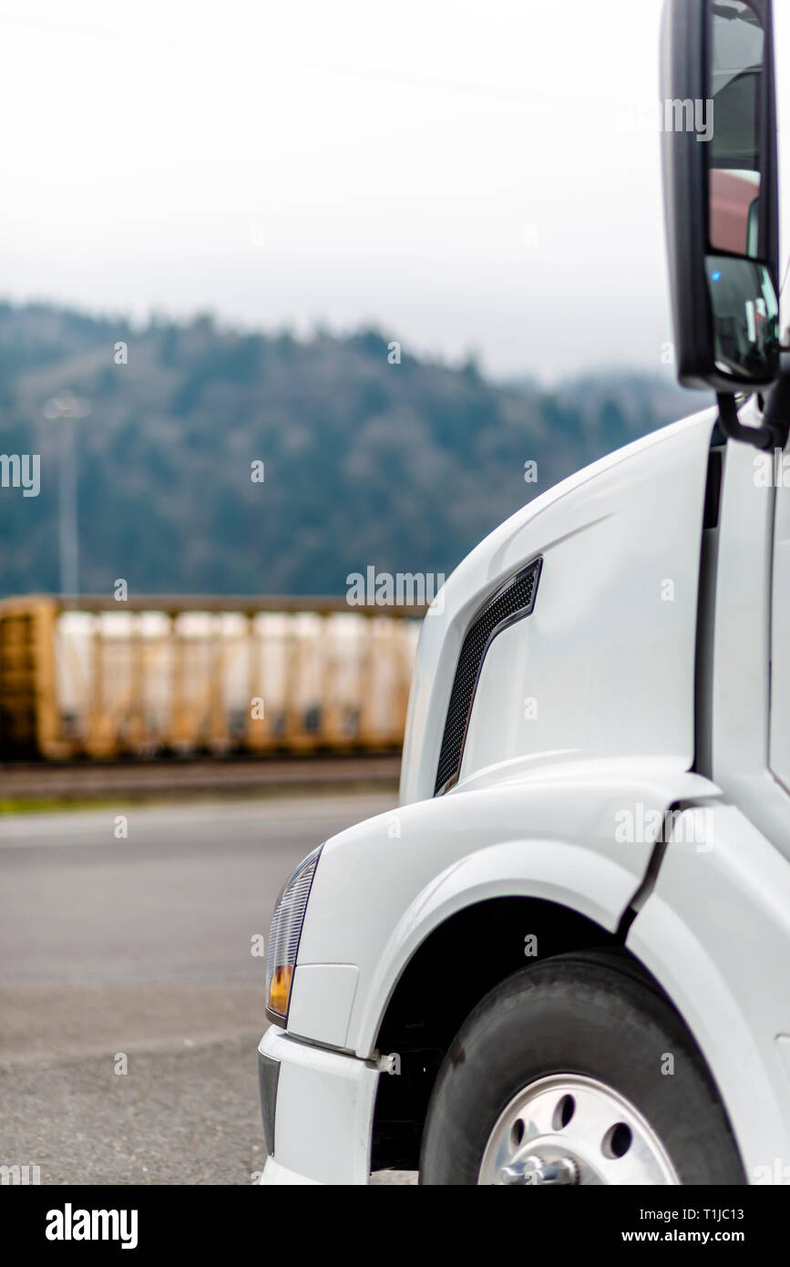 The front of professional industrial grade cab and hood of modern big ...