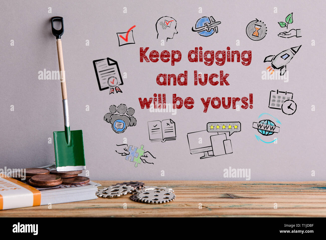 Keep digging and luck will be yours Stock Photo - Alamy