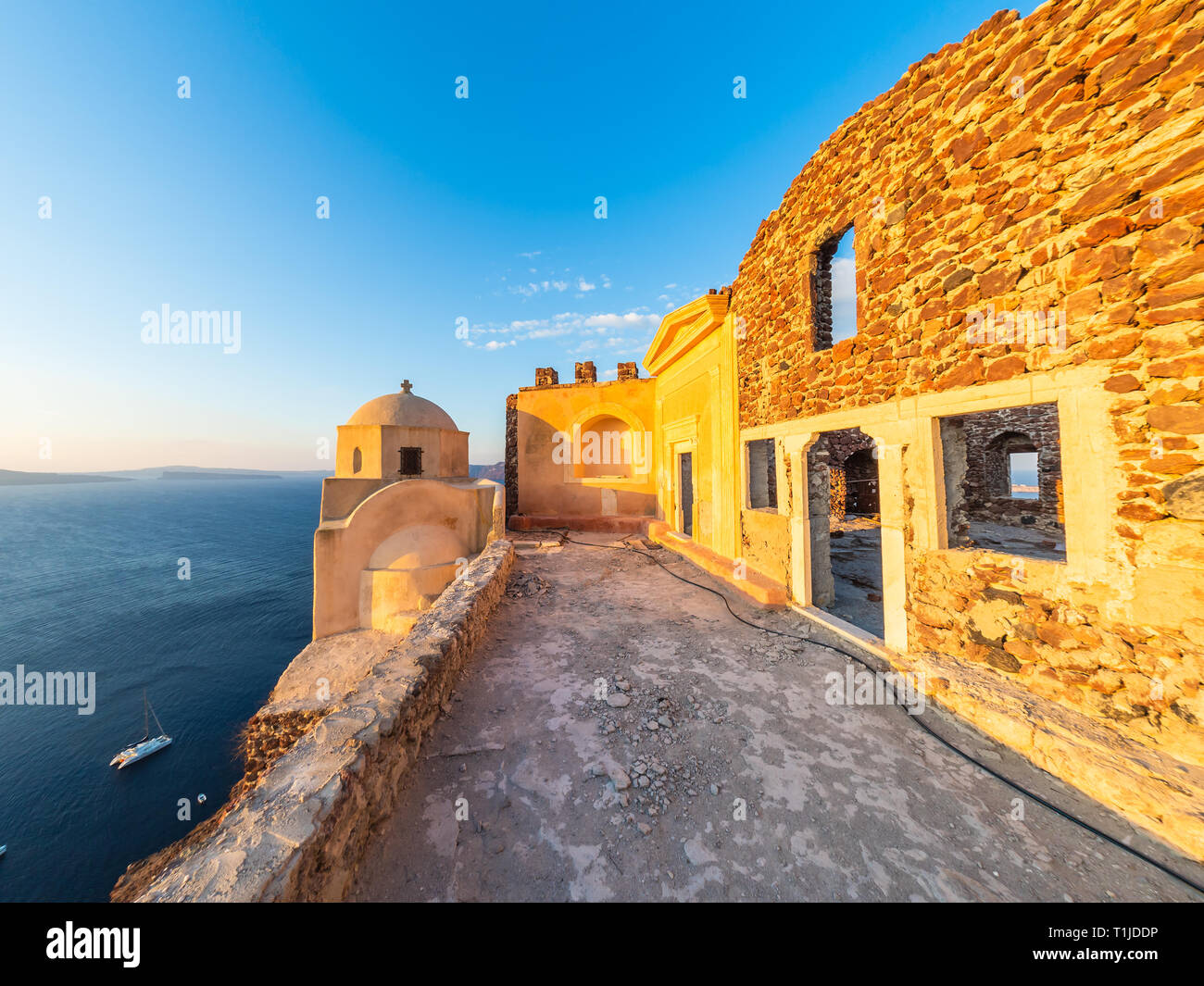 The ruins of the Venetian castle in Oia Santorini Greece Stock Photo ...