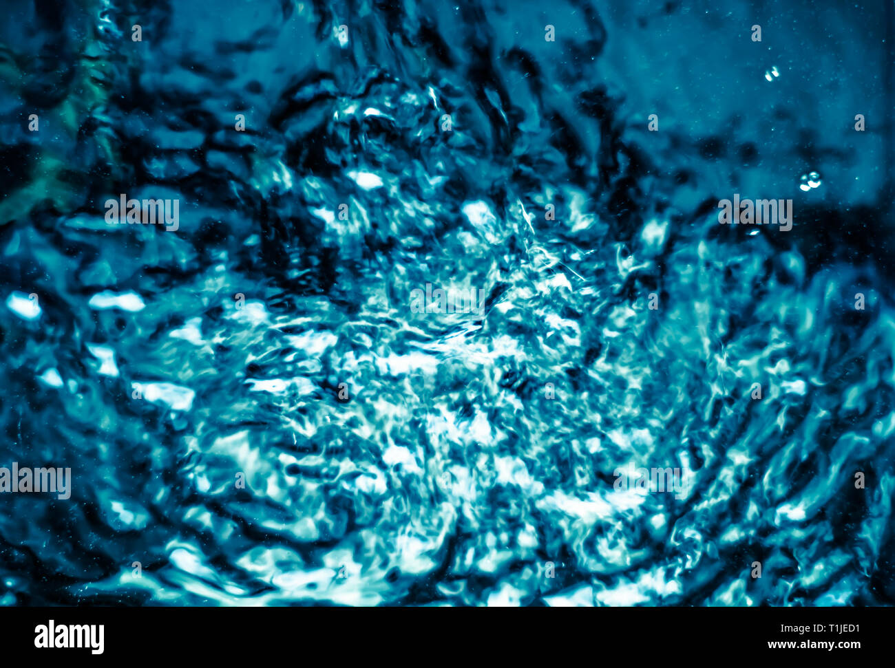 Abstract blue liquid surface as background - futuristic design and ...