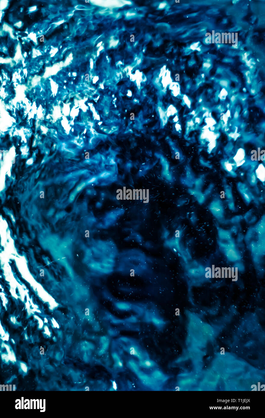 Abstract blue liquid surface as background - futuristic design and ...