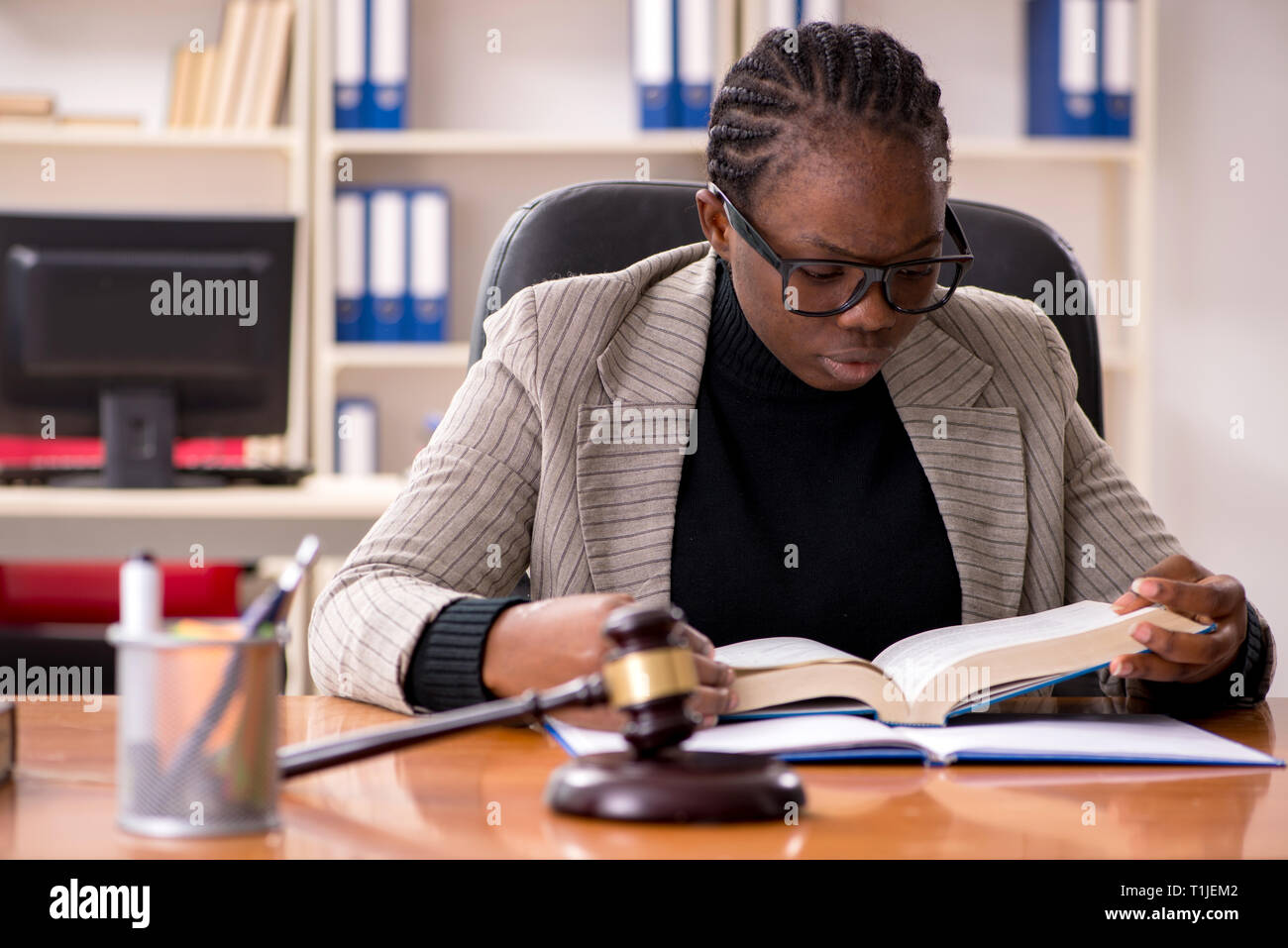 Black female lawyer in courthouse Stock Photo - Alamy