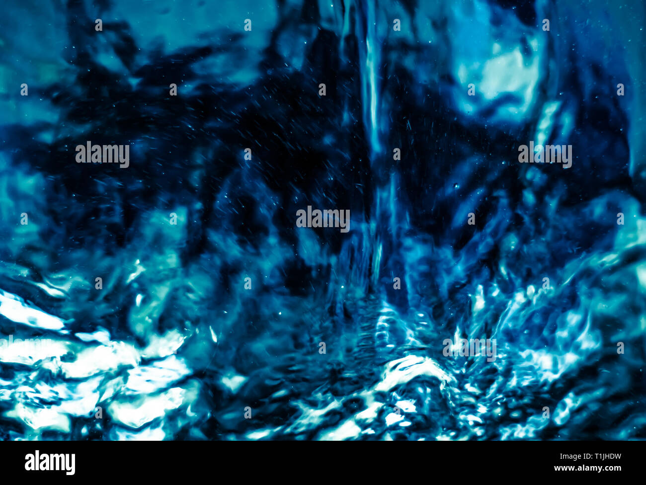 Abstract blue liquid surface as background - futuristic design and ...