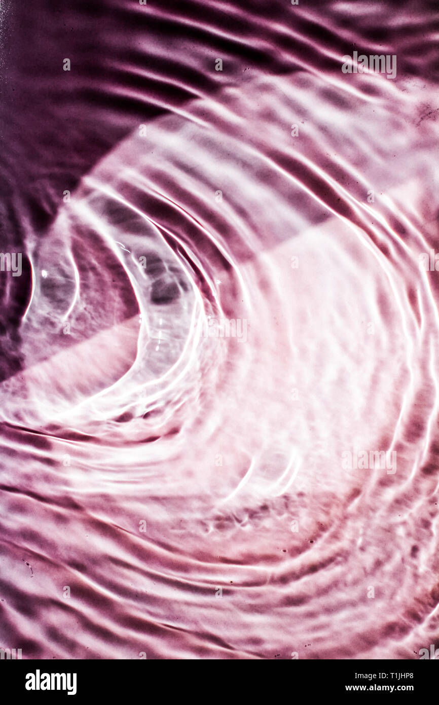 Pink flowing water texture as an abstract background - colourful ...