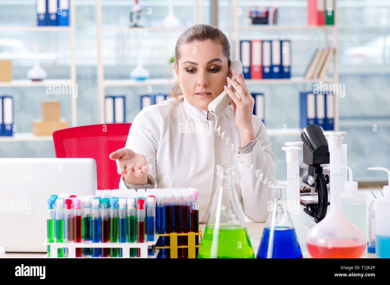 Female chemist working in medical lab Stock Photo - Alamy