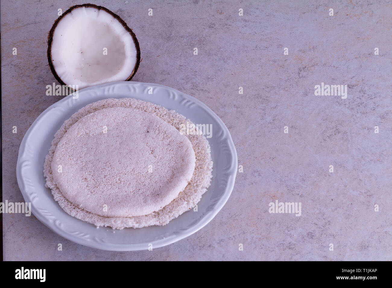 Tapioca with coconut in white background Stock Photo - Alamy