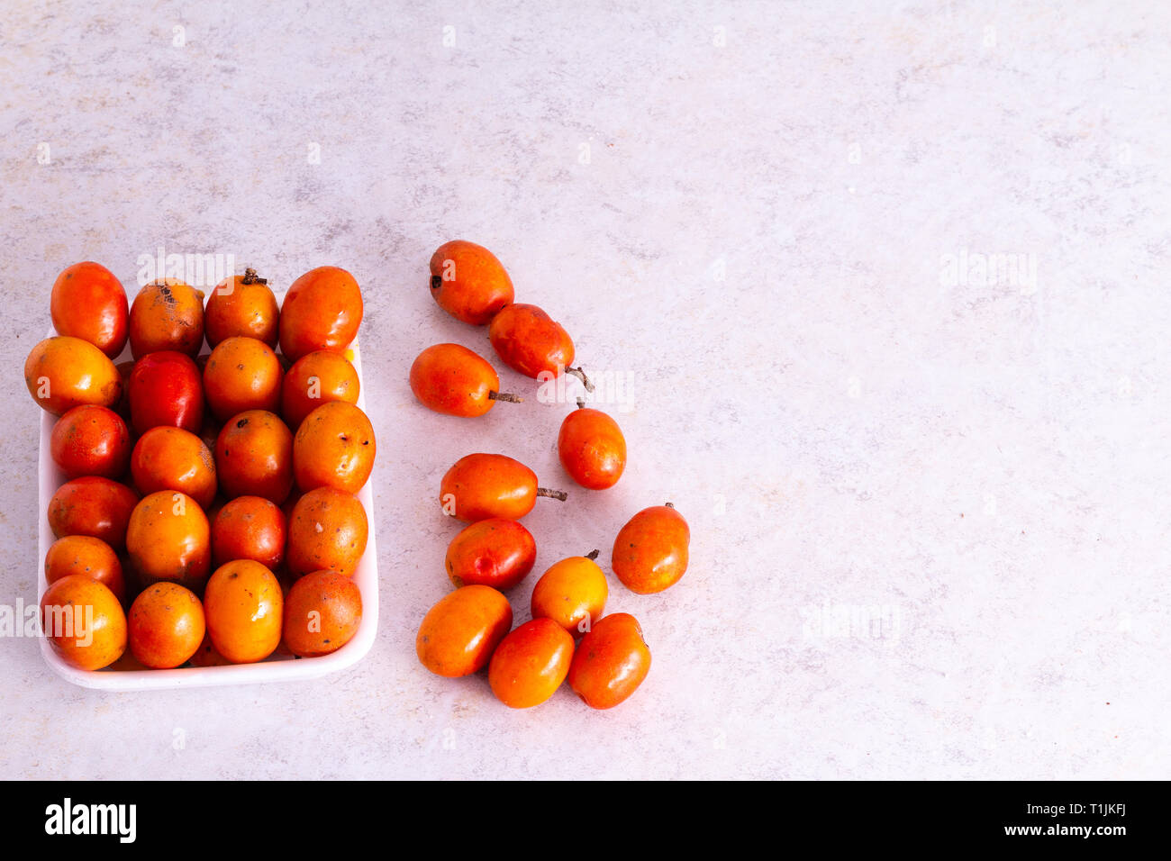 Siriguela fruit with white background Stock Photo - Alamy
