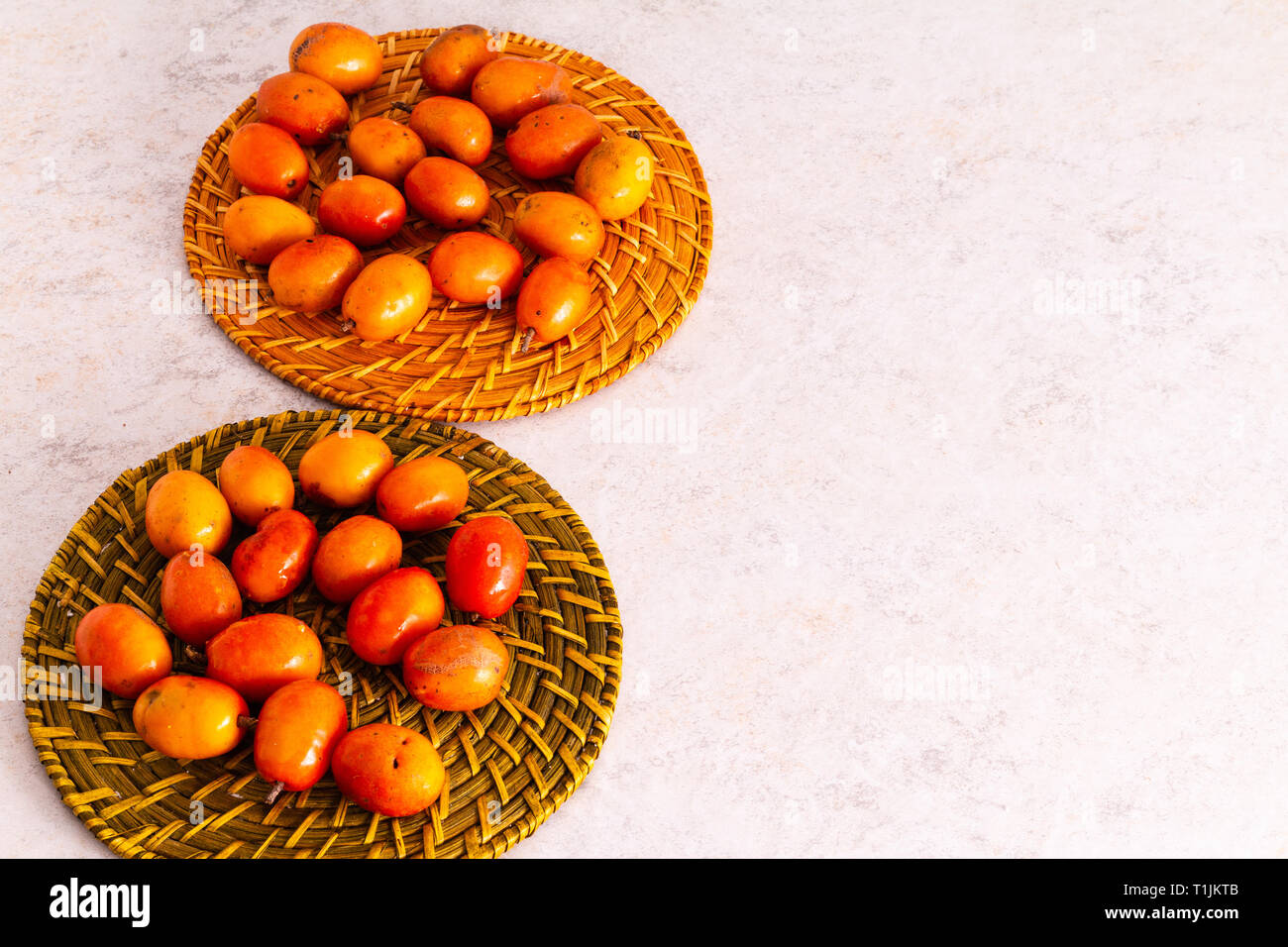 Siriguela fruit with white background Stock Photo - Alamy