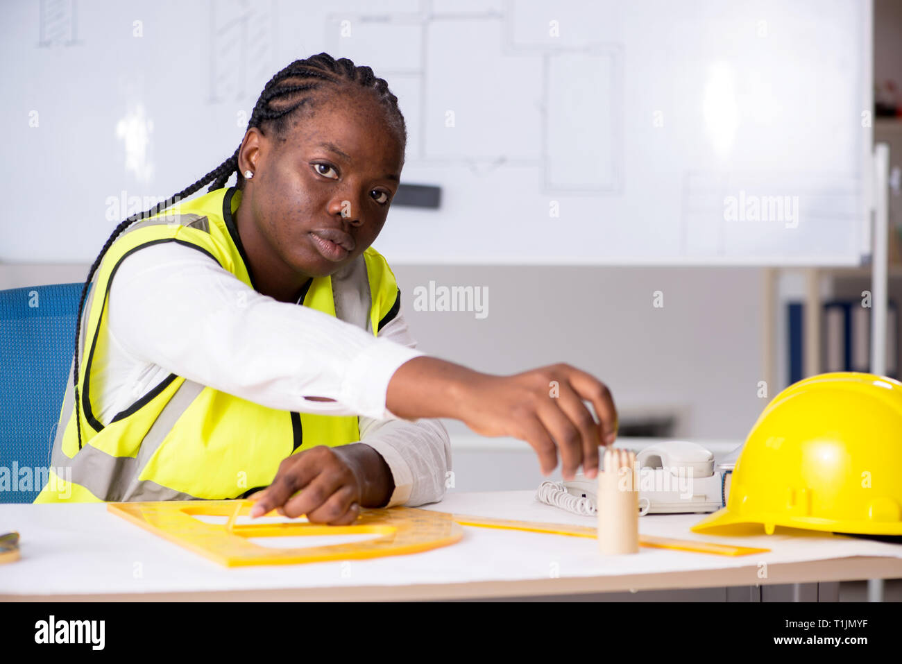 Young black architect working on project Stock Photo - Alamy