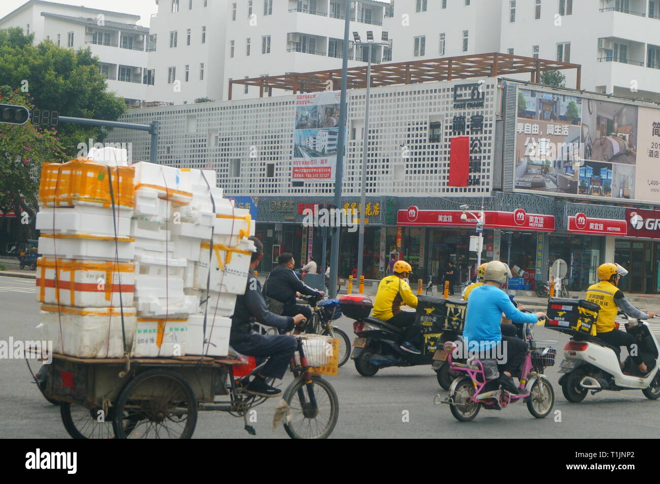 Shenzhen, China: Logistics Express Brothers on the Street Stock Photo ...