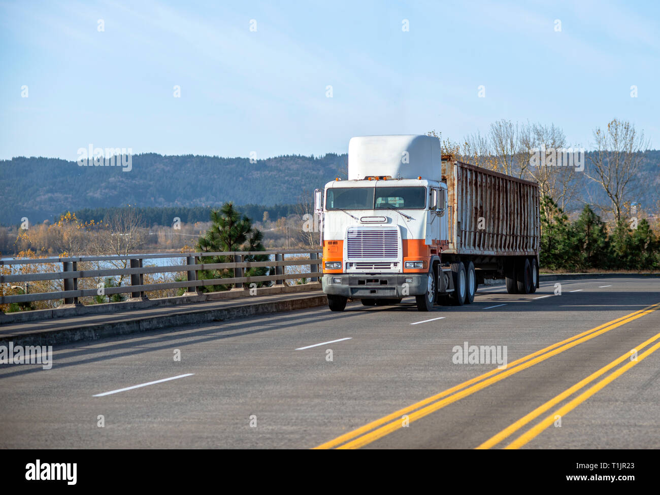 Old fashion bonnet cab-over professional big rig semi truck with roof ...