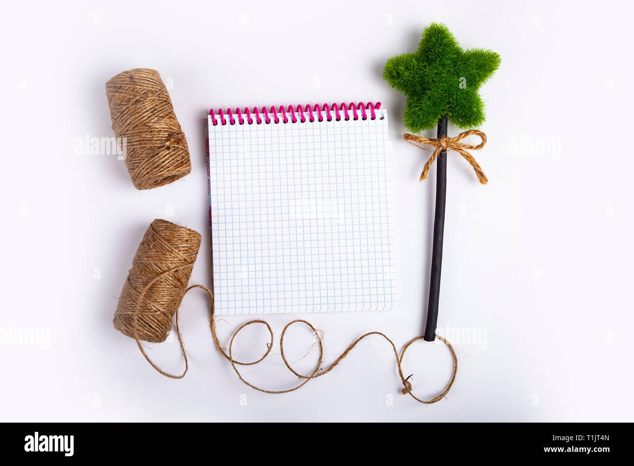 Decorative grass star, notebook and rope on a white background Stock ...