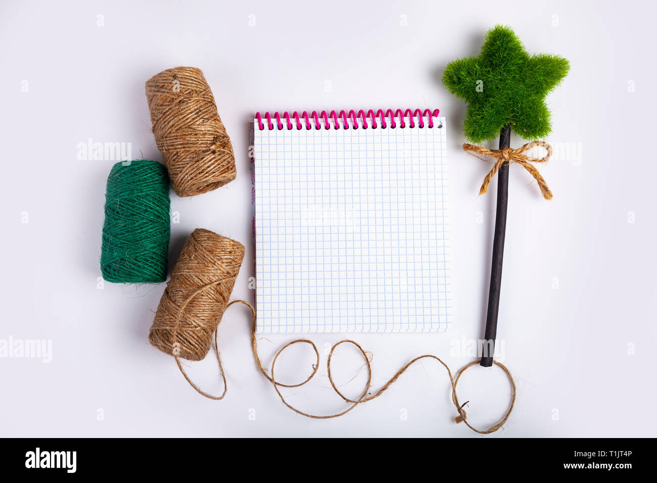 Decorative grass star, notebook and rope on a white background Stock ...