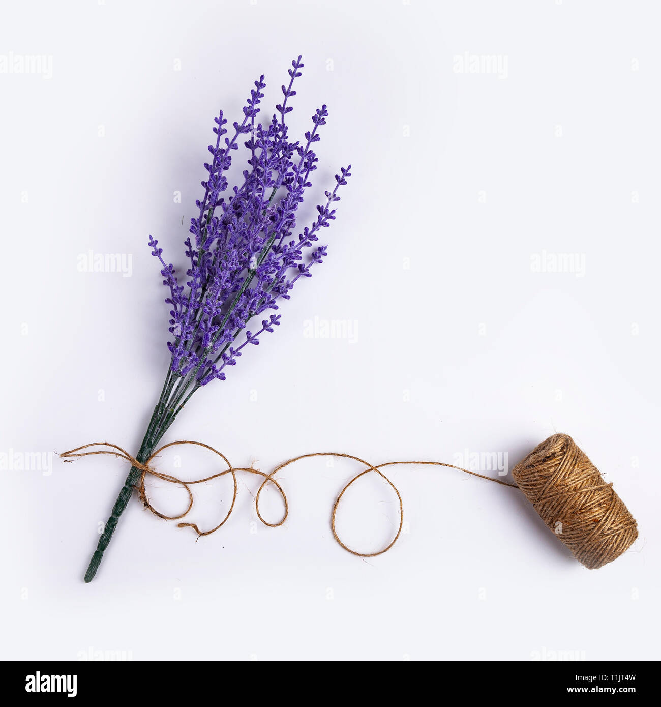 Lavender and rope on a white background Stock Photo - Alamy