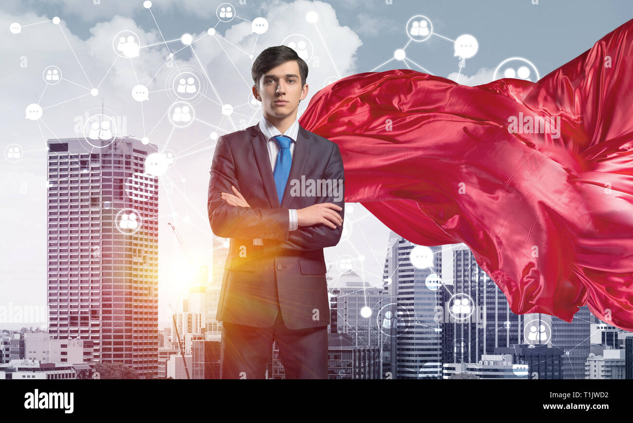 Concept of power and sucess with businessman superhero in big city ...
