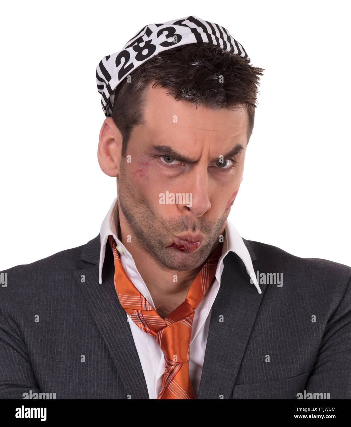 Close up of a convict with bloody lip, beaten and bruised, isolated ...