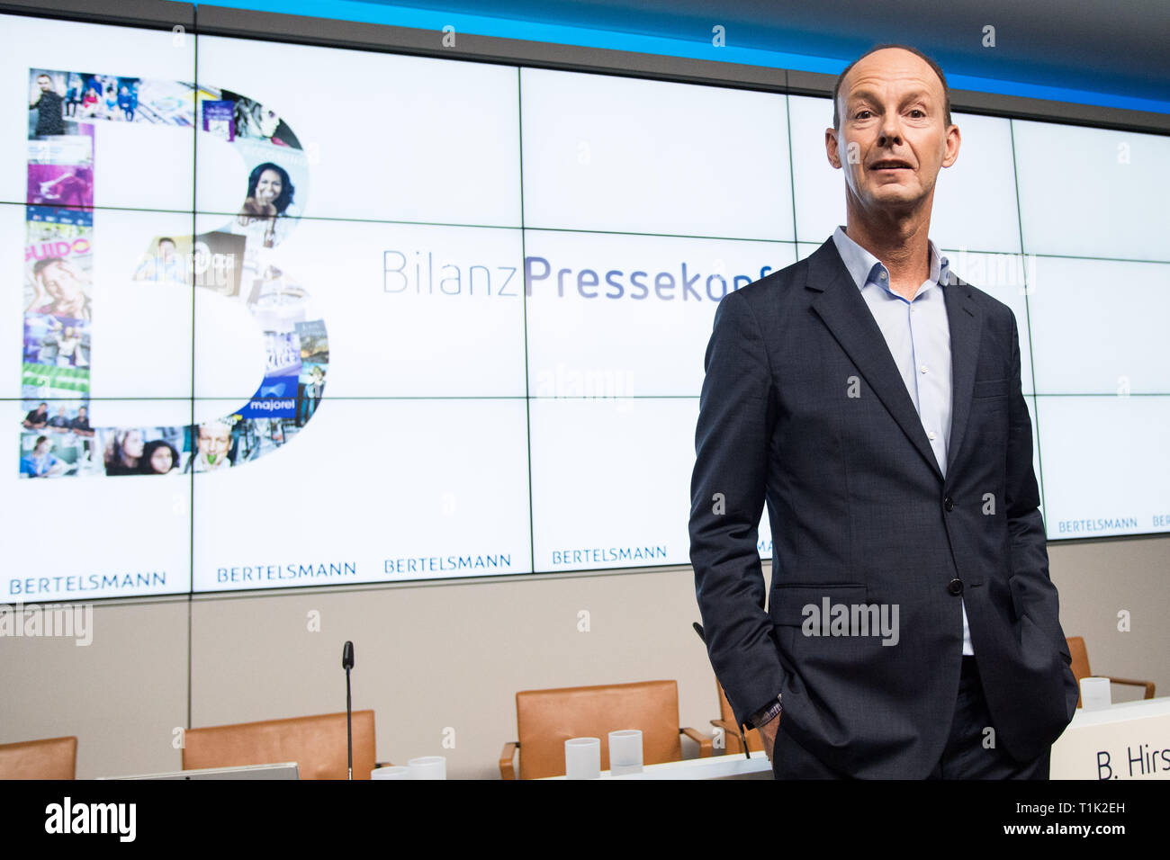 Dr. Thomas RABE (Chief Executive Officer, CEO), in front of the display ...