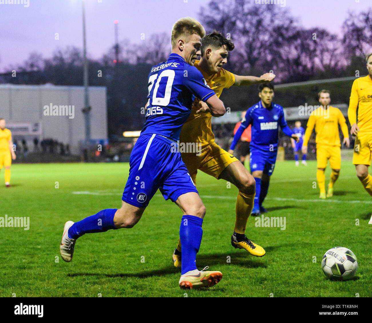Mannheim, Deutschland. 27th Mar, 2019. Alexander Groiss (KSC) duels ...