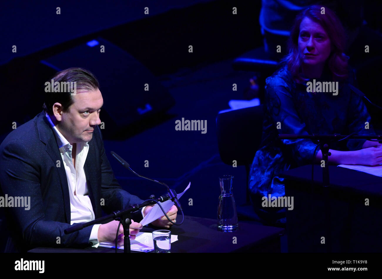 27 March 2019, North Rhine-Westphalia, Köln: The actors Charly Hübner ...