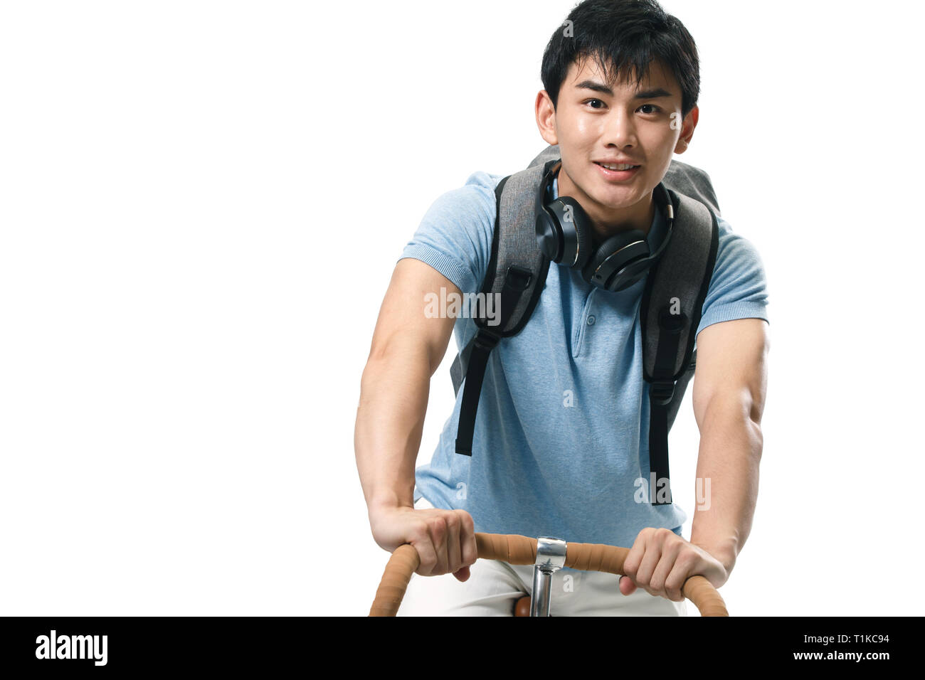 The young college students to ride a bicycle Stock Photo - Alamy