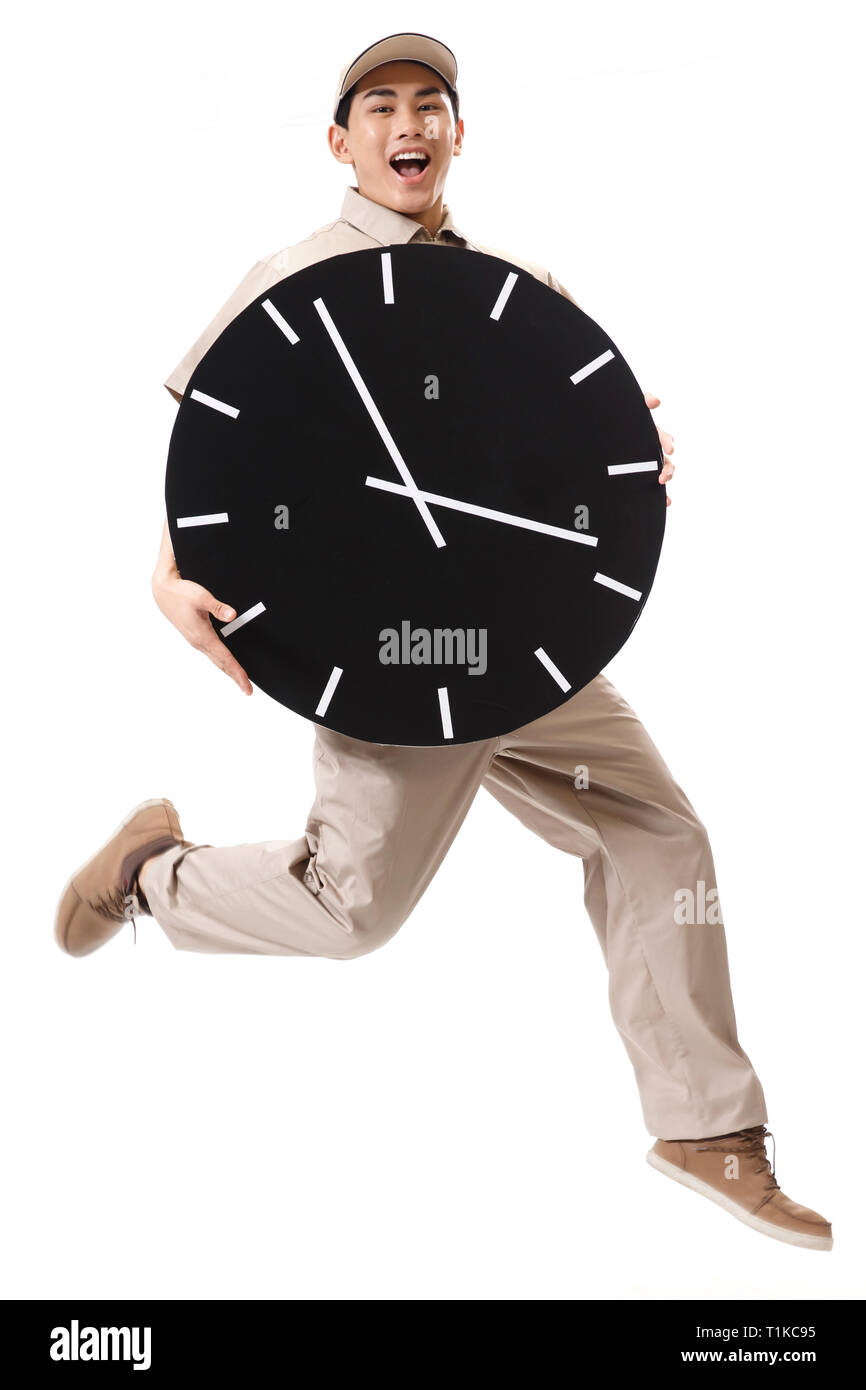 Young Courier with a clock Stock Photo - Alamy