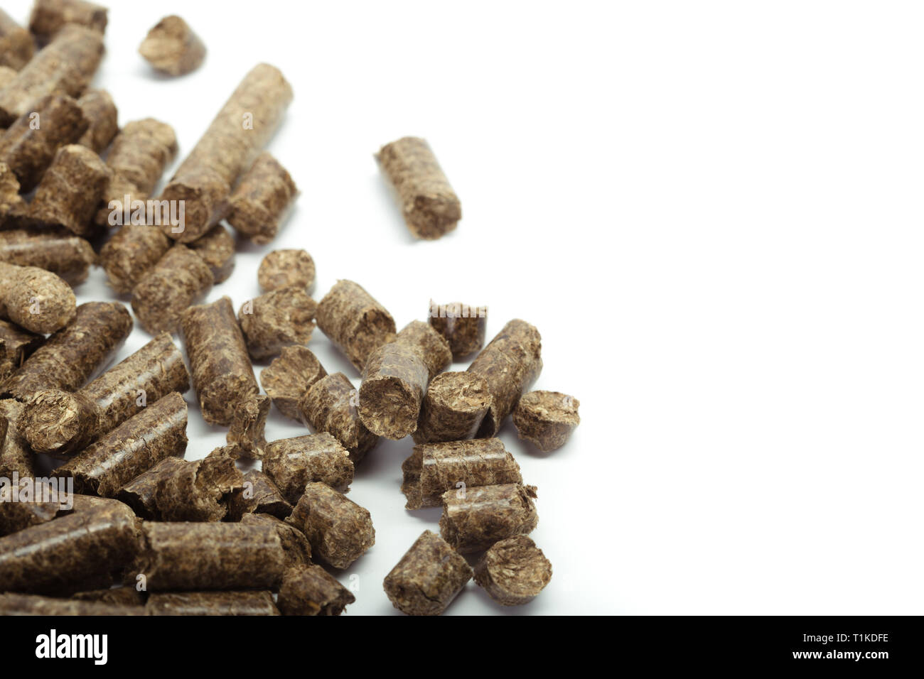 stack of wooden pellets for bio energy, white background, isolated ...