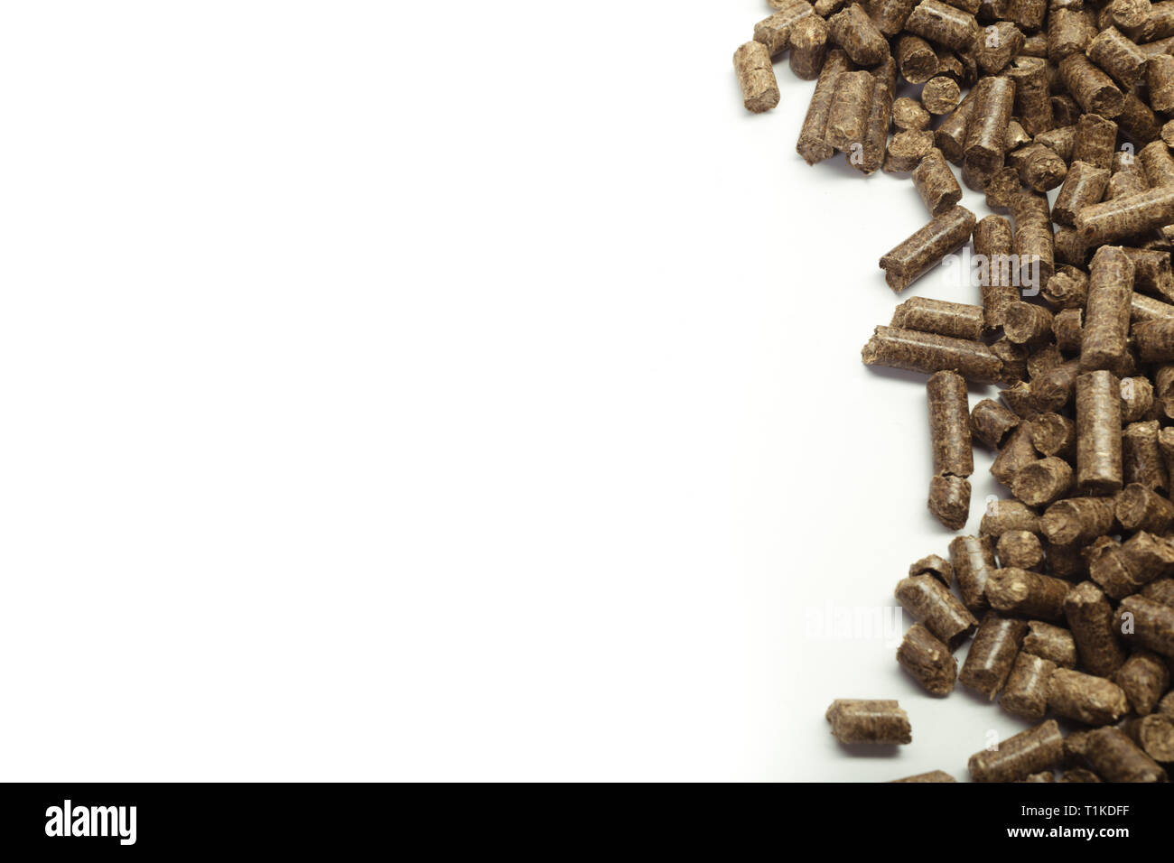 stack of wooden pellets for bio energy, white background, isolated ...