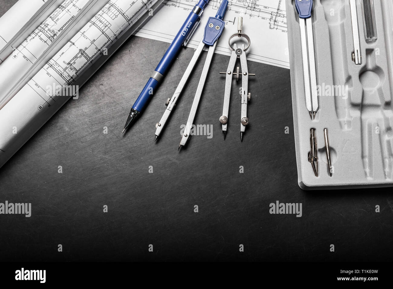 Construction planning drawings on black background Stock Photo - Alamy