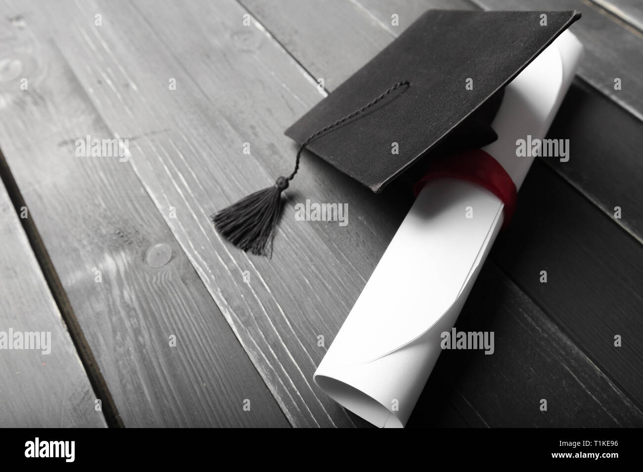 Black Graduation Cap with Degree Stock Photo - Alamy