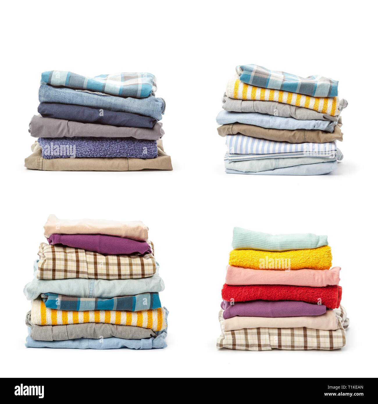 stacks of clothing collection isolated on white Stock Photo - Alamy