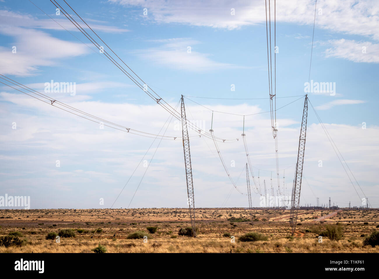 Overhead high voltage power lines Stock Photo - Alamy