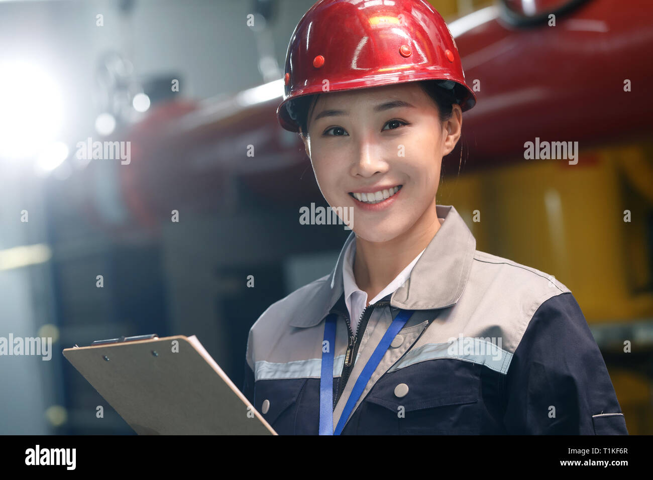 Technicians work in a factory Stock Photo - Alamy