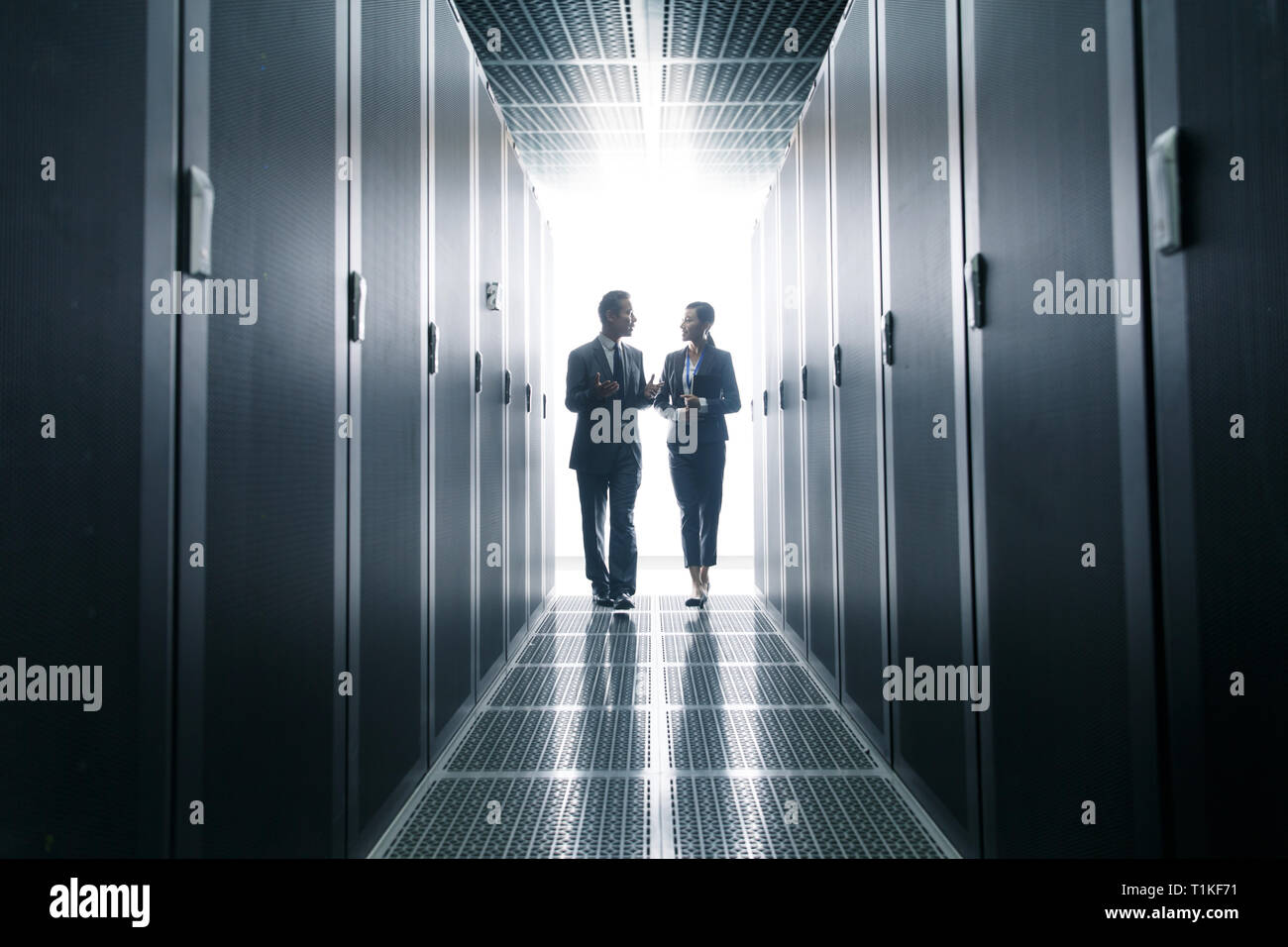 Technical personnel in machine room inspection Stock Photo - Alamy