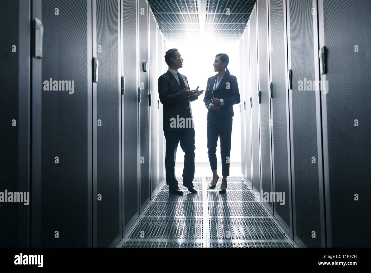 Technical personnel in machine room inspection Stock Photo - Alamy