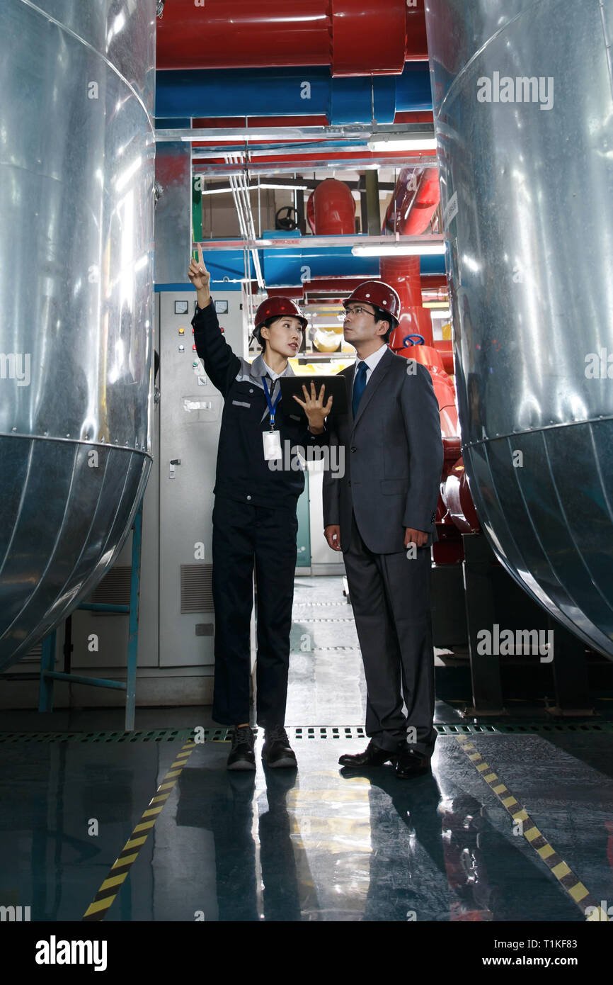Technical personnel in the factory inspection Stock Photo - Alamy