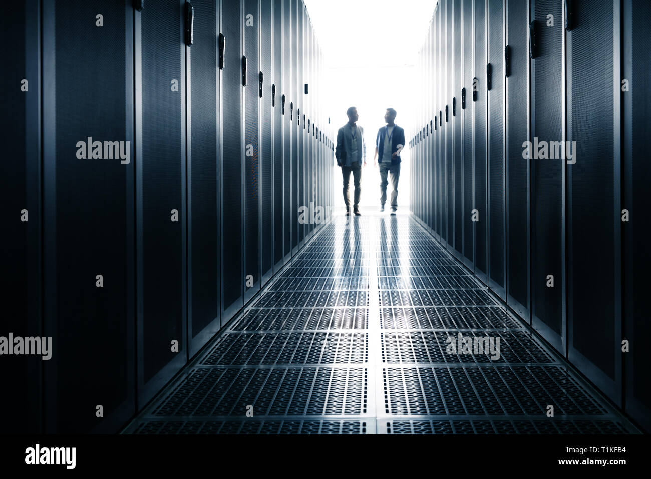 Technical personnel in machine room inspection Stock Photo - Alamy