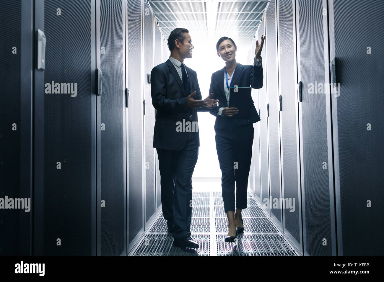 Technical personnel in machine room inspection Stock Photo - Alamy
