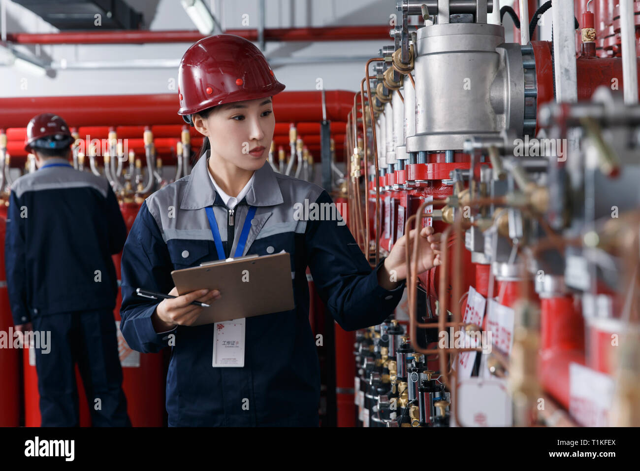 Technical personnel in the factory fire control room inspection Stock ...