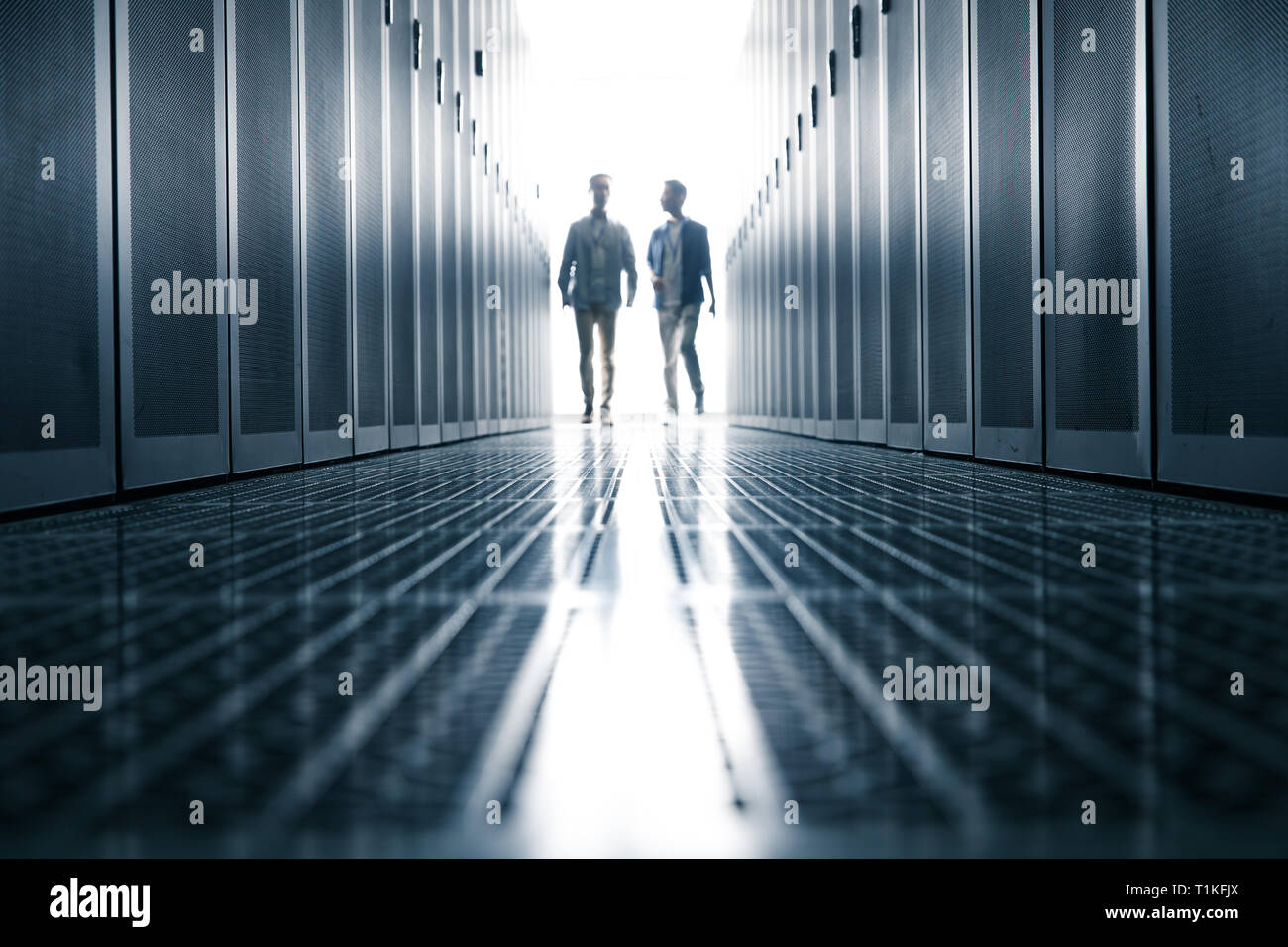 Technical personnel in machine room inspection Stock Photo - Alamy