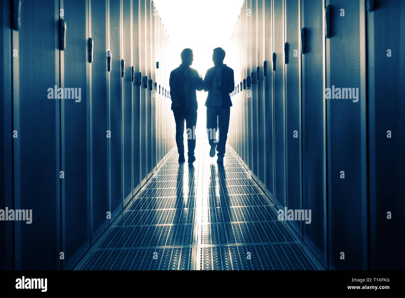 Technical personnel in machine room inspection Stock Photo - Alamy